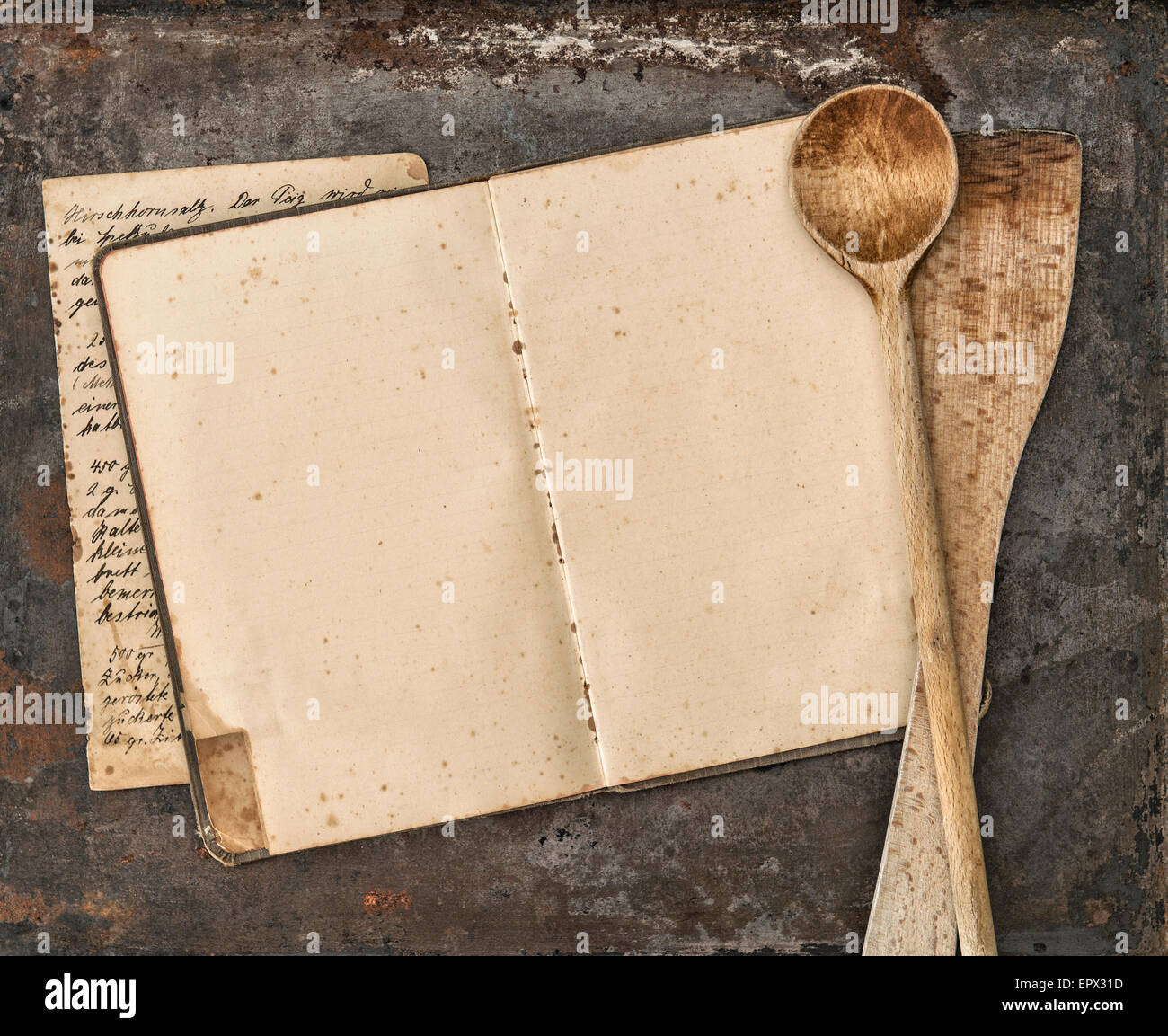 Vintage handwritten recipe book and old kitchen utensils on rustic ...