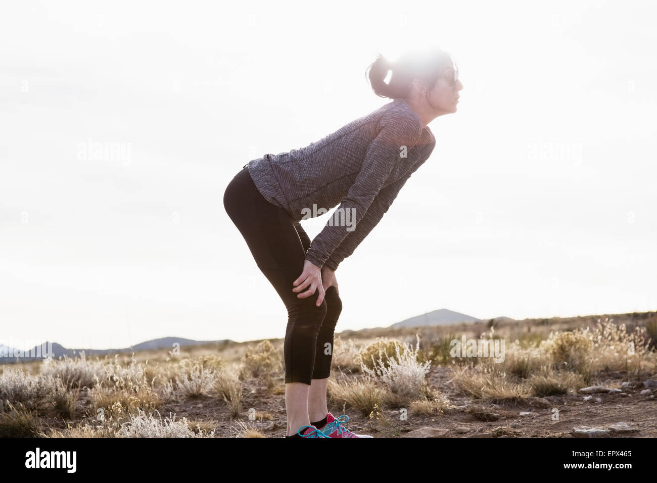Hand on knee hi-res stock photography and images - Alamy