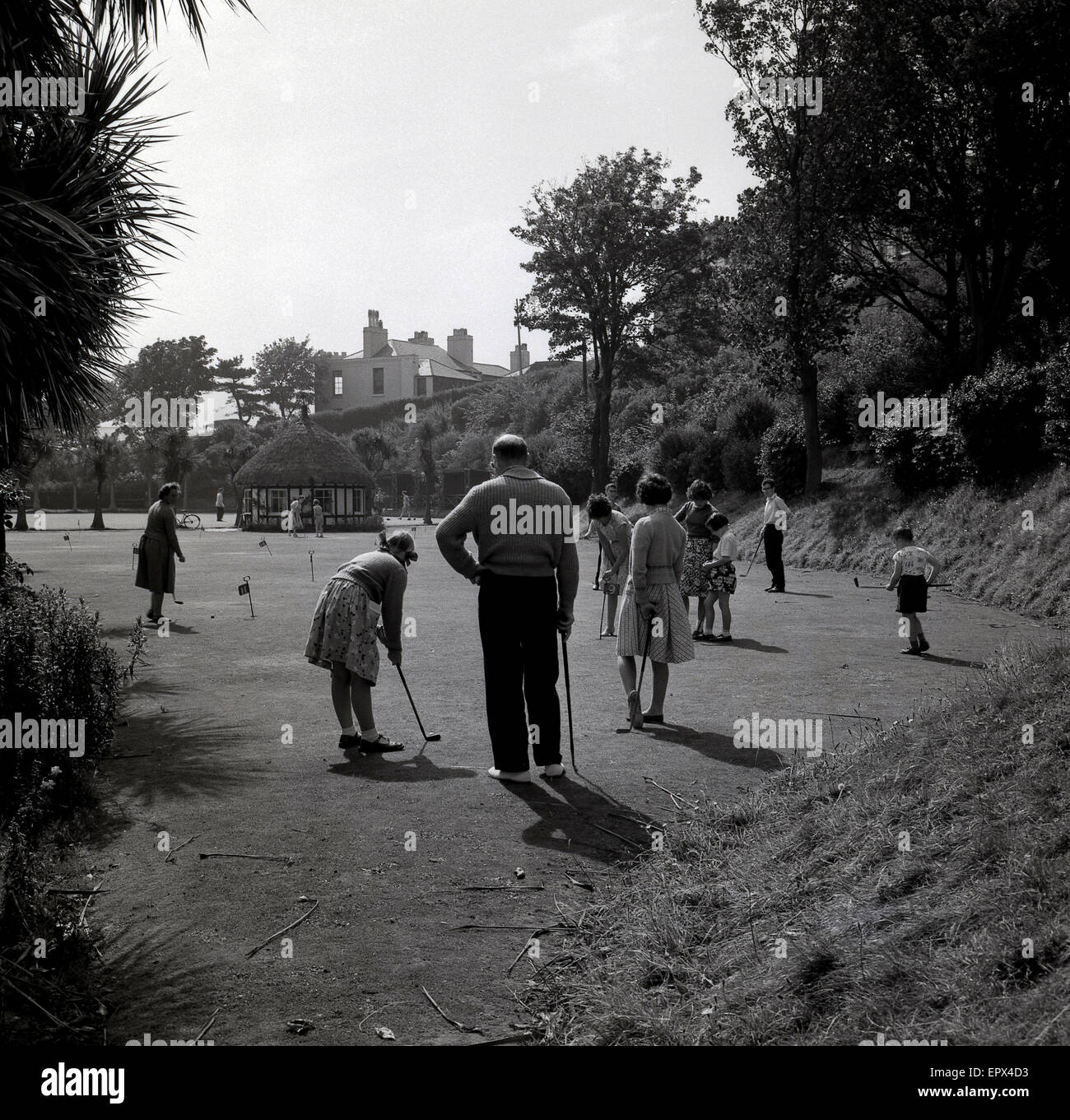 1950s, historical, family on a putting green near the seaside, Sidmouth ...