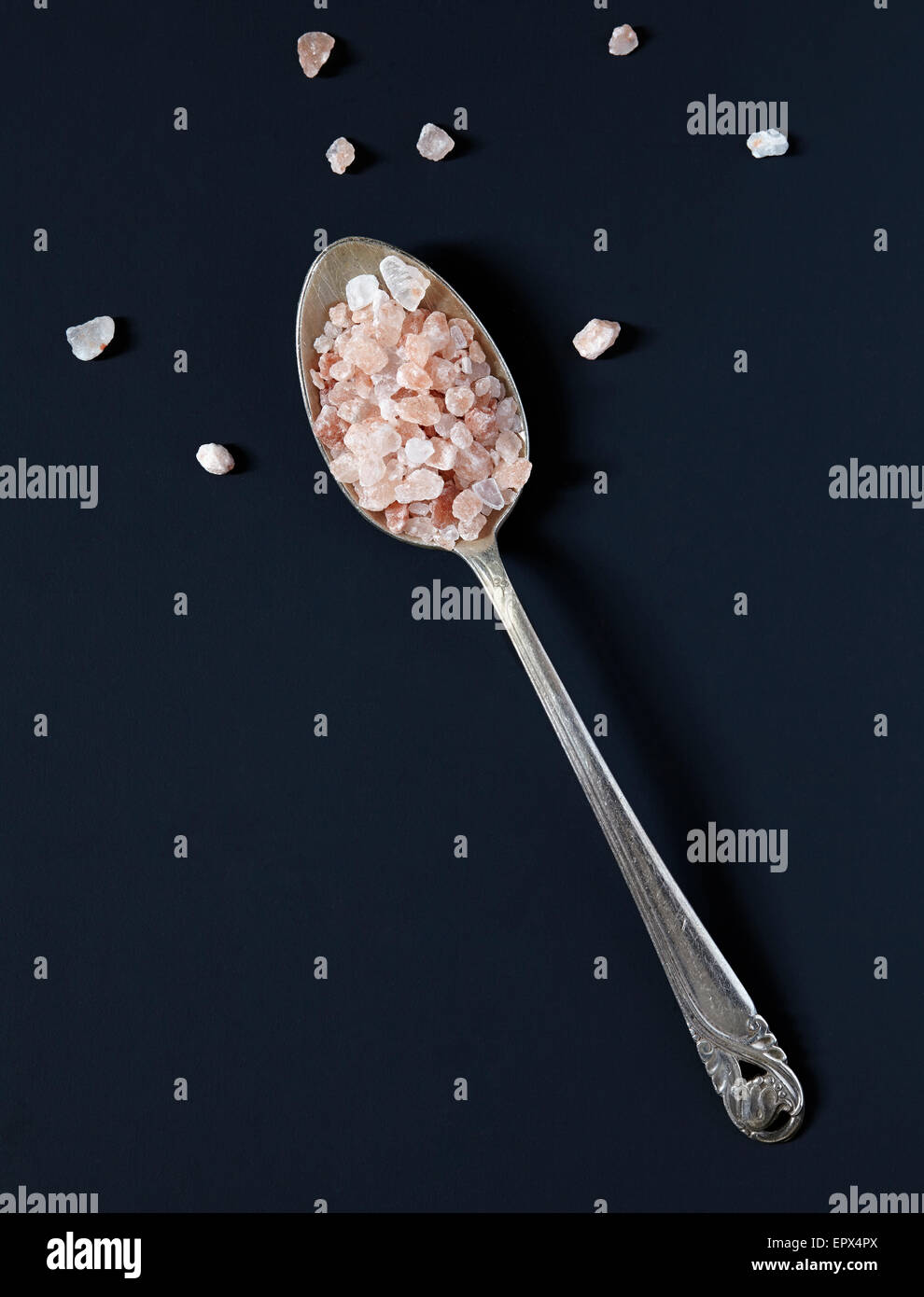 Sea salt crystals on spoon Stock Photo - Alamy