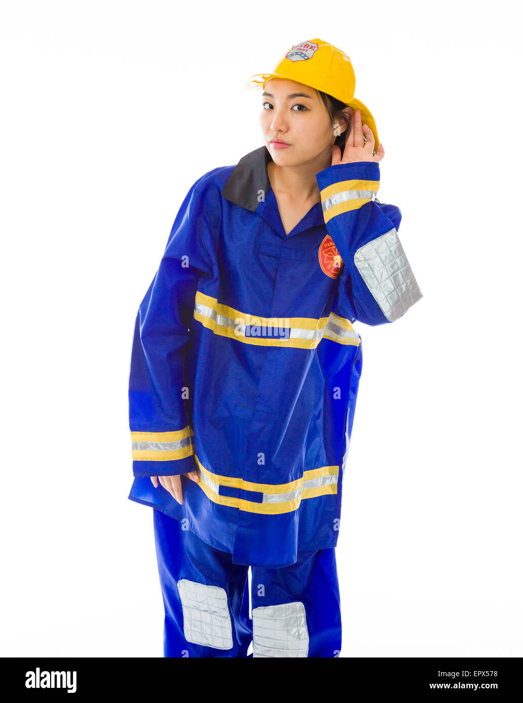 Nosy lady firefighter trying to listen carefully isolated on white ...
