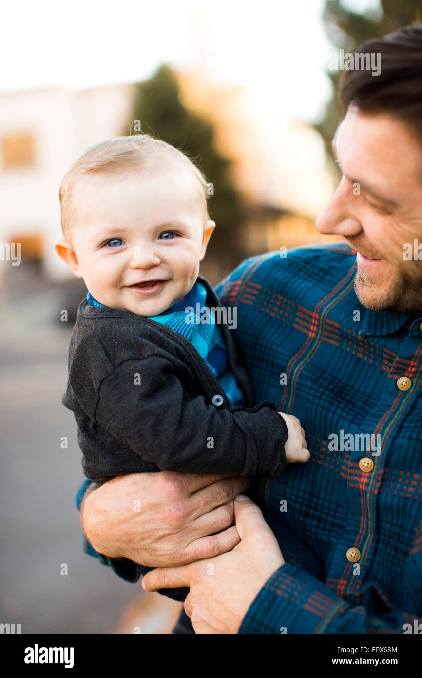 Father holding baby son (6-11 months Stock Photo - Alamy