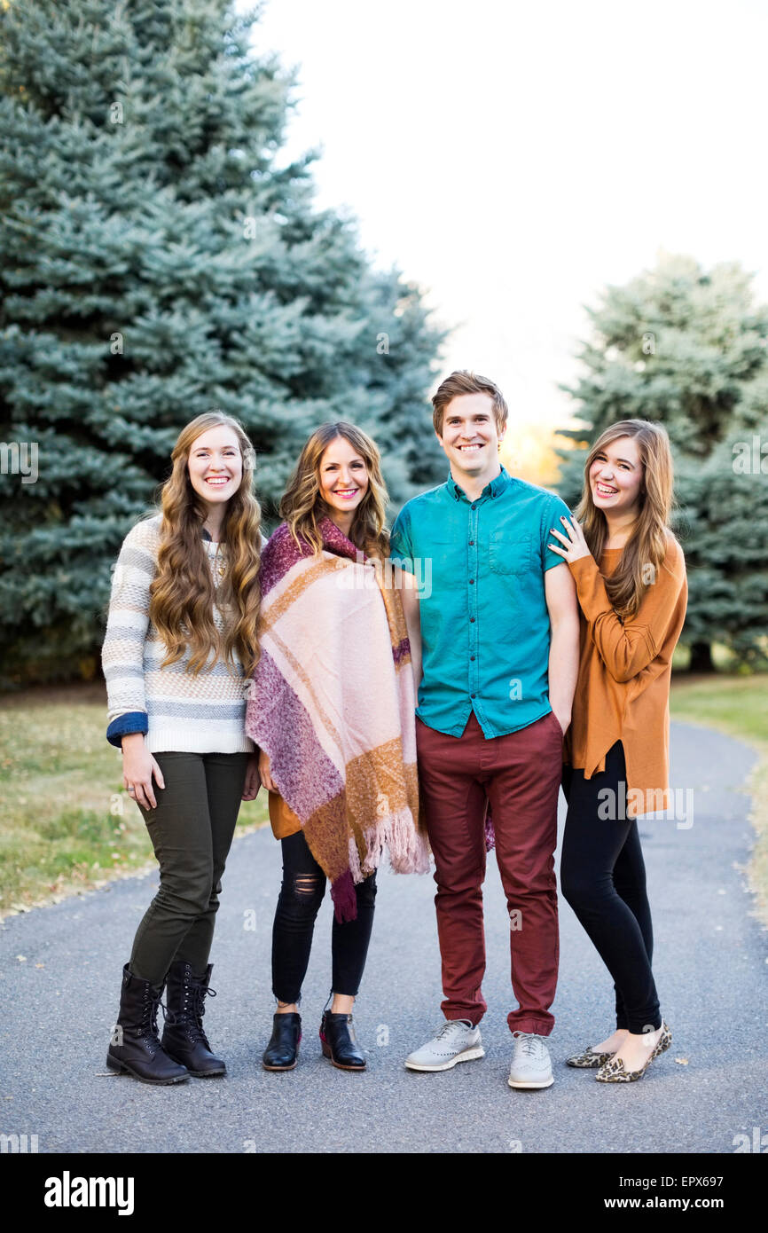 Portrait of four friends smiling Stock Photo - Alamy