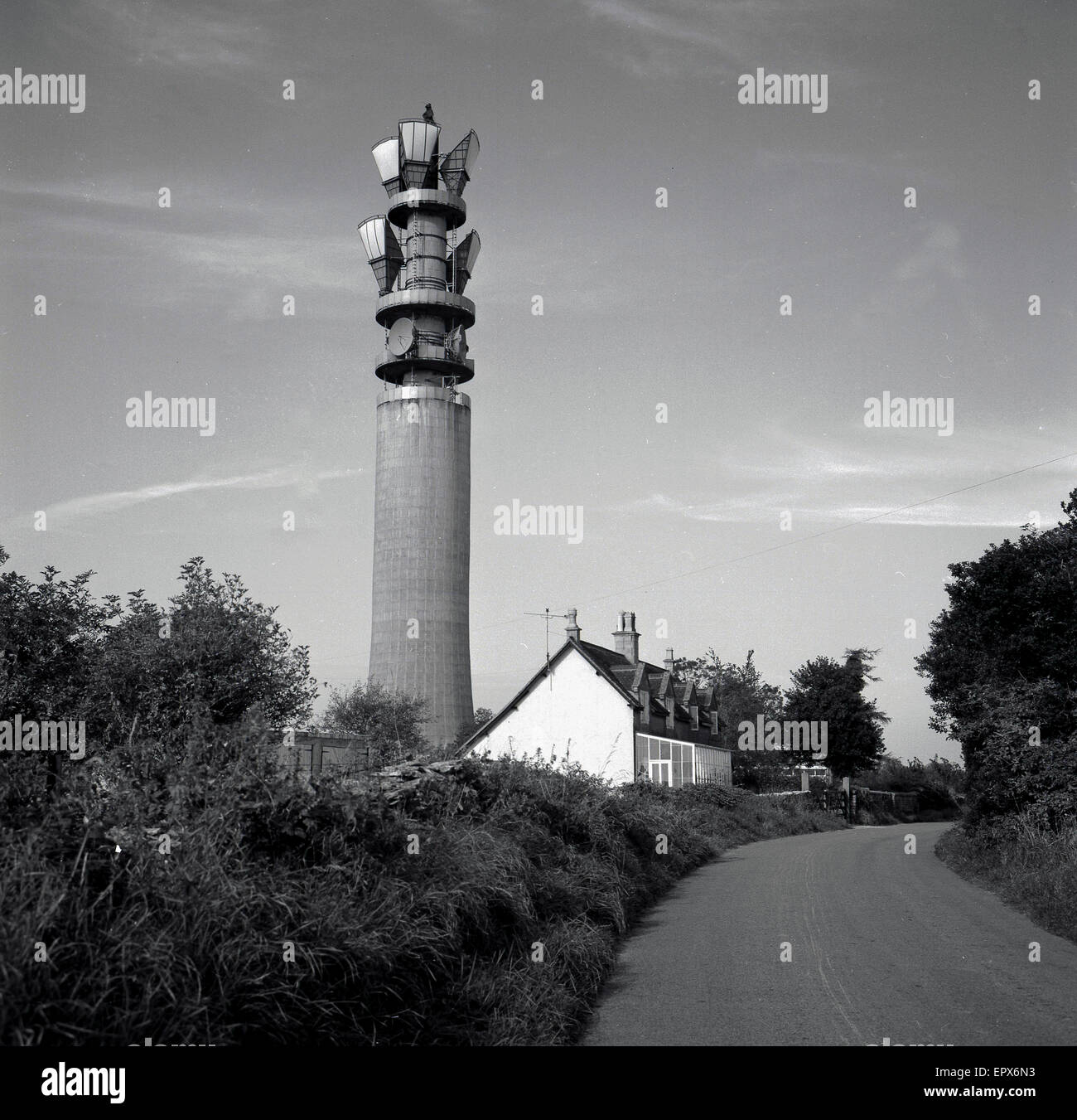 1950s, historical, a quiet country lane showing a BT telecommunications ...