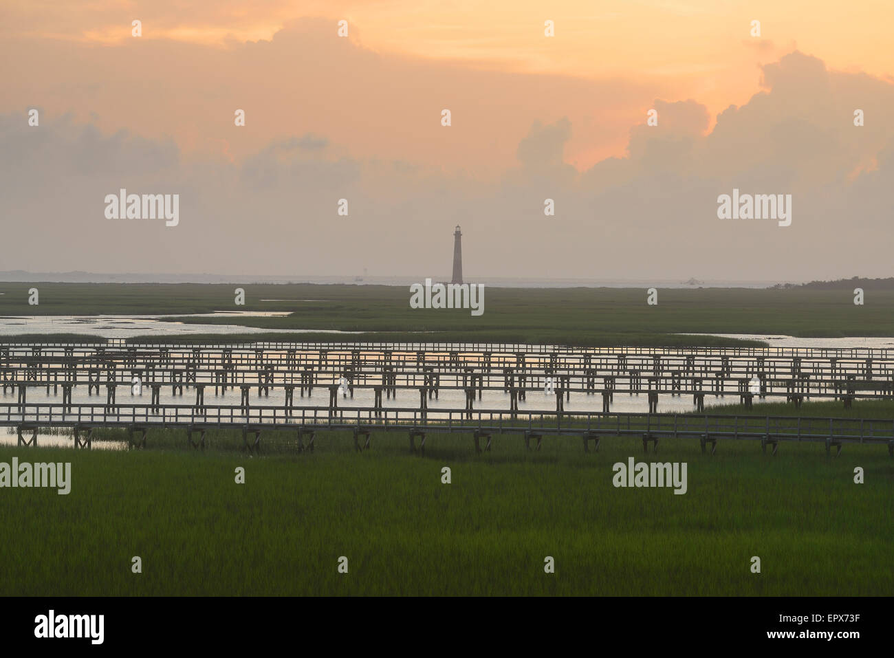 USA, South Carolina, Folly Beach, Morris Island Lighthouse across inlet ...