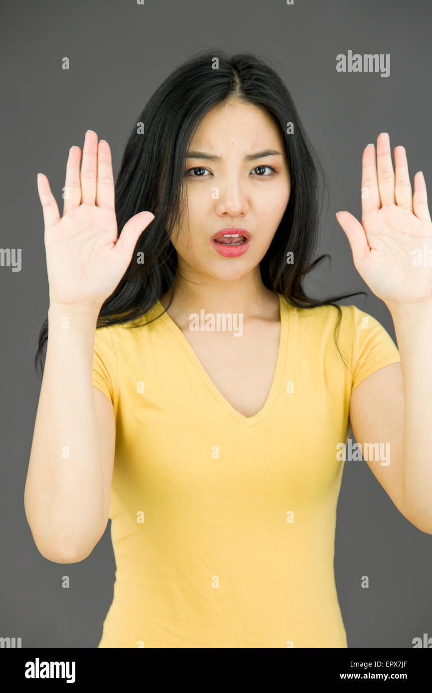 Young Asian woman making stop gesture sign from both hands Stock Photo ...