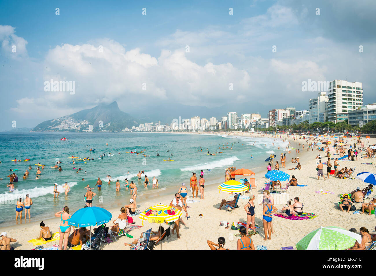 RIO DE JANEIRO, BRAZIL - MARCH 01, 2015: Beachgoers relax on Ipanema ...