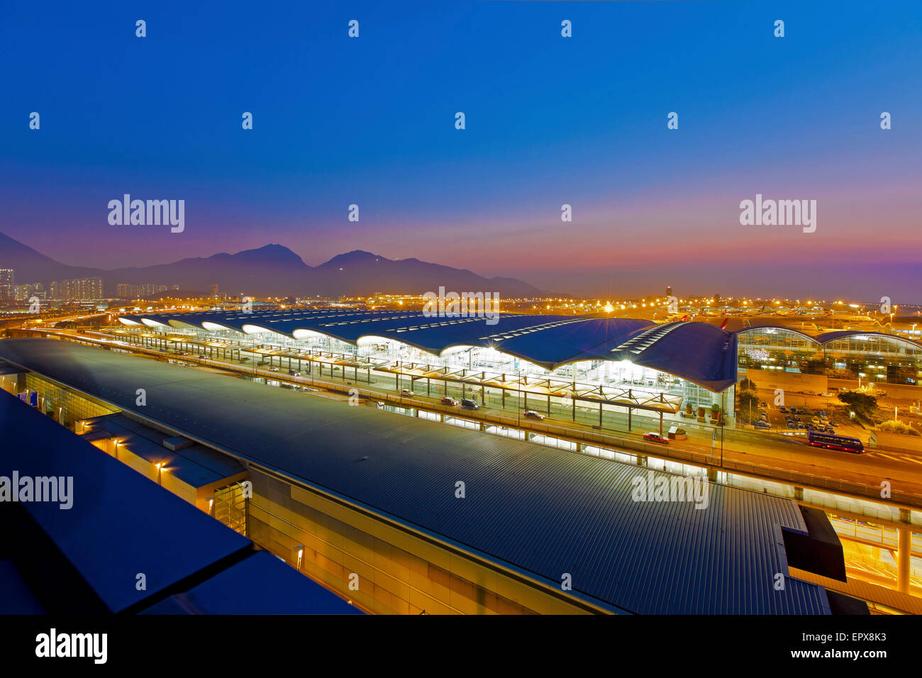 Sunset at airport terminal Stock Photo - Alamy