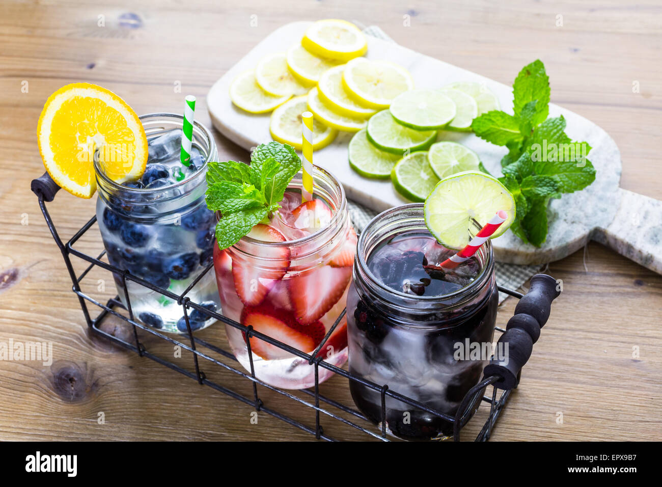 Infused water with fresh organic berries Stock Photo - Alamy