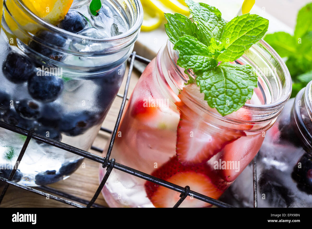 Infused water with fresh organic berries Stock Photo - Alamy