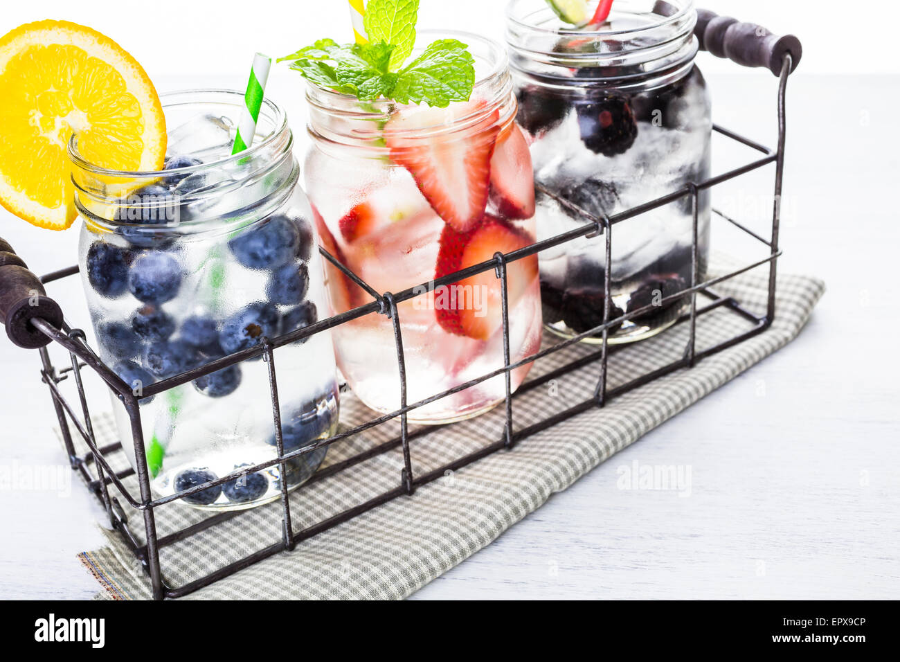 Infused water with fresh organic berries Stock Photo - Alamy