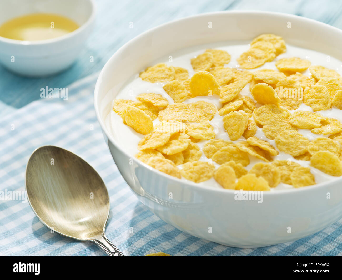 Cornflakes cereal and milk. Morning breakfast Stock Photo - Alamy
