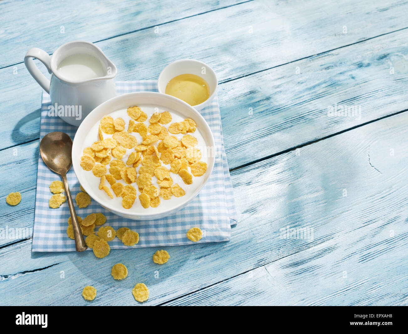 Cornflakes cereal and milk. Morning breakfast Stock Photo - Alamy
