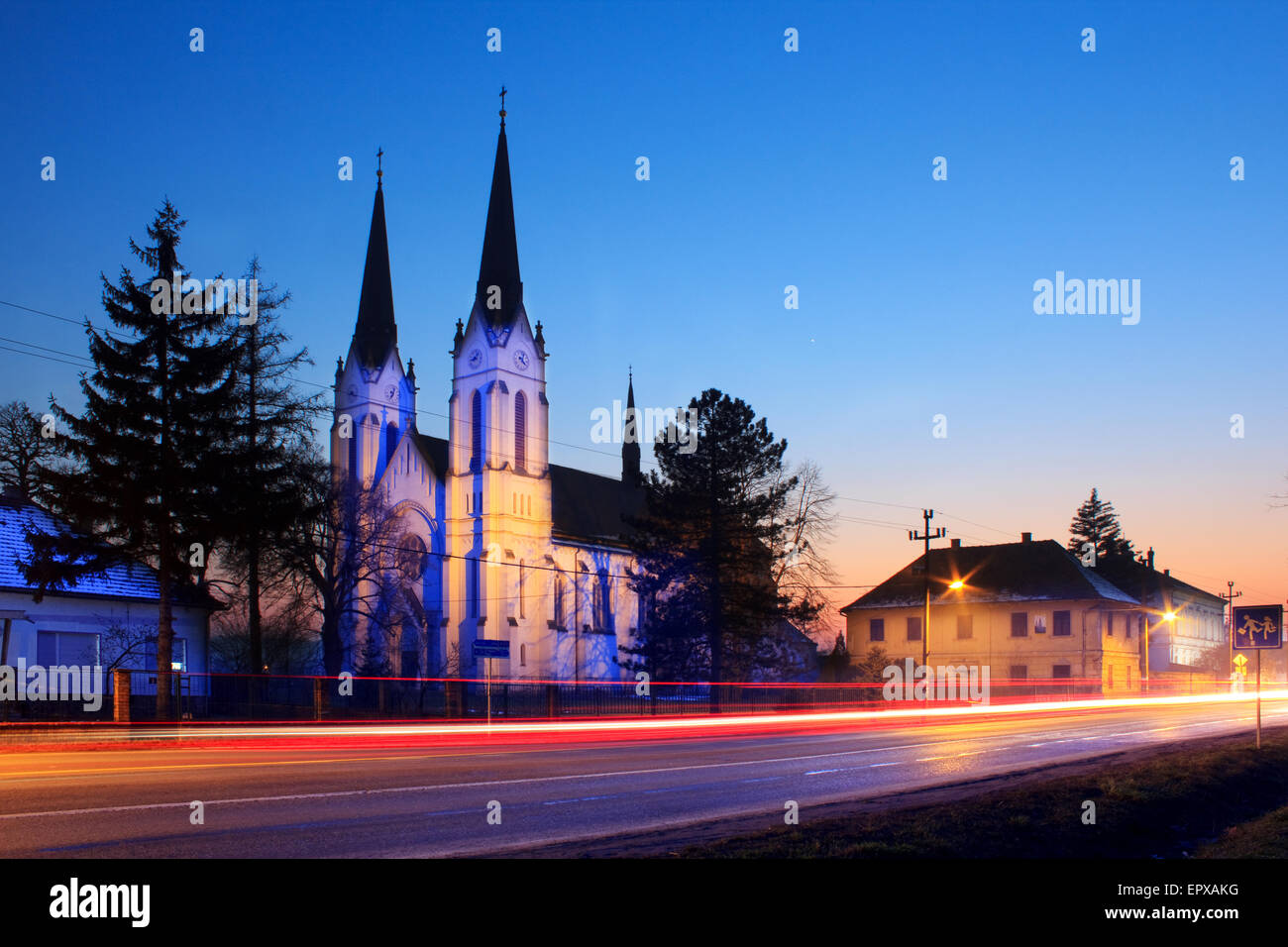 Catholic church at dusk Stock Photo - Alamy