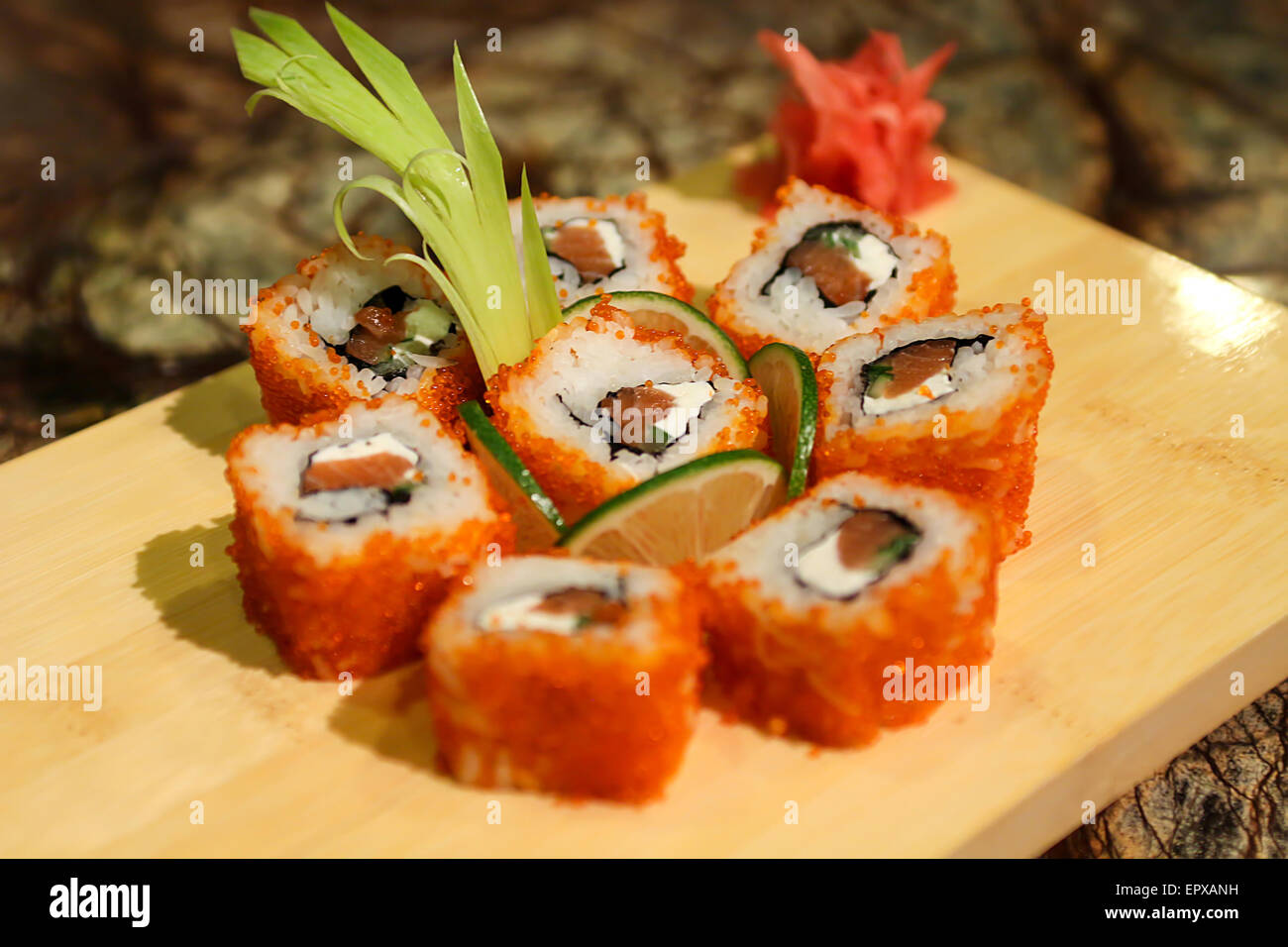 Delicious Philly maki sushi rolls served with a wood plate Stock Photo ...
