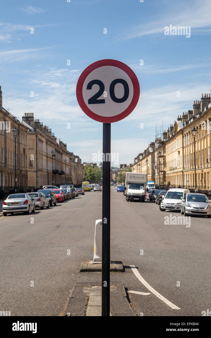 A twenty (20 MPH) Mile Per Hour Speed restriction sign post central in ...