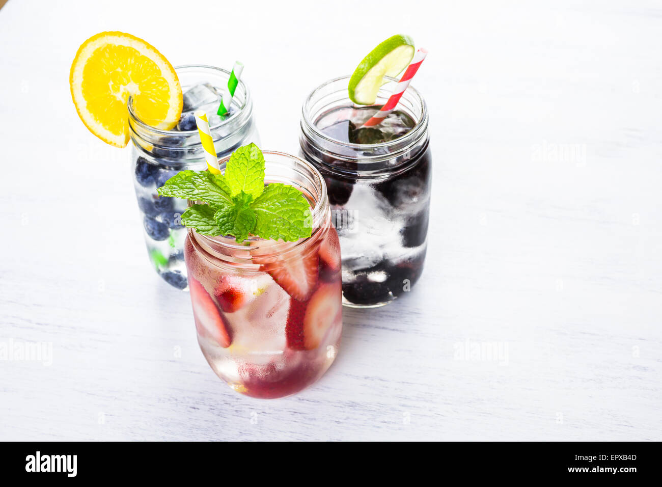 Infused water with fresh organic berries Stock Photo - Alamy
