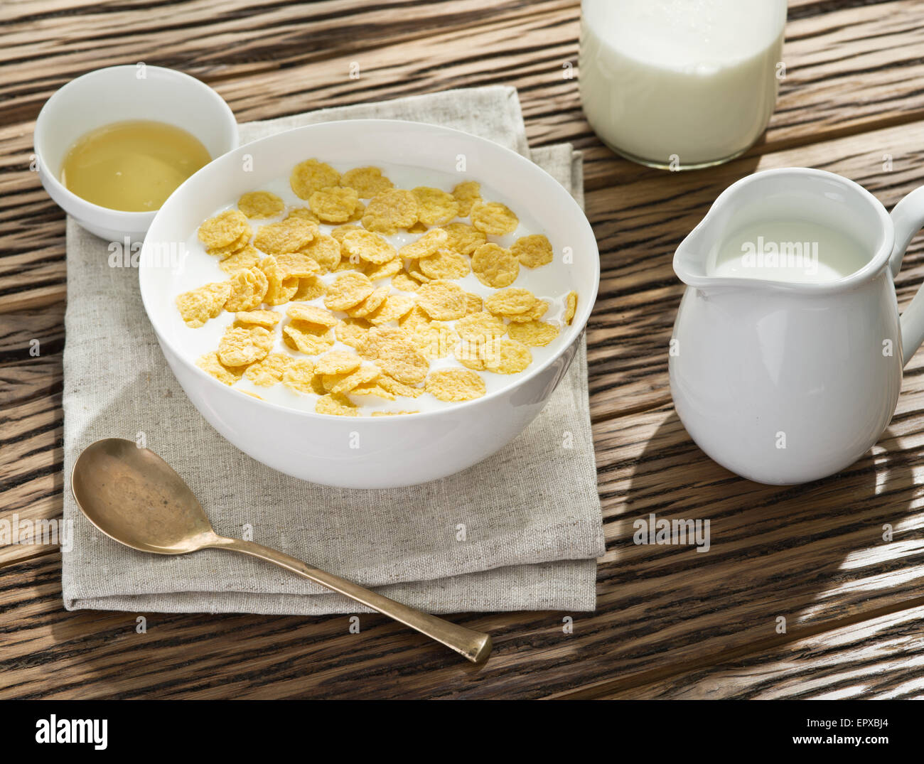 Cornflakes cereal and milk. Morning breakfast Stock Photo - Alamy