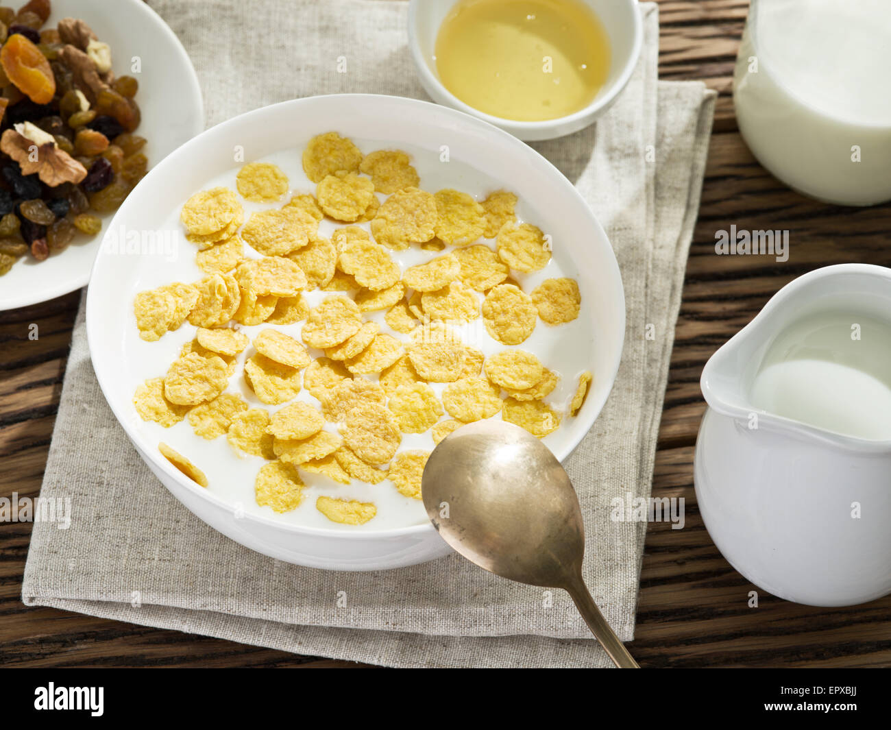 Cornflakes cereal and milk. Morning breakfast Stock Photo - Alamy