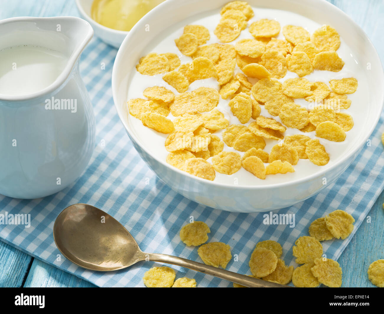 Cornflakes cereal and milk. Morning breakfast Stock Photo - Alamy