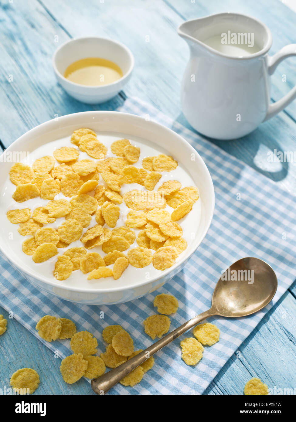 Cornflakes cereal and milk. Morning breakfast Stock Photo - Alamy