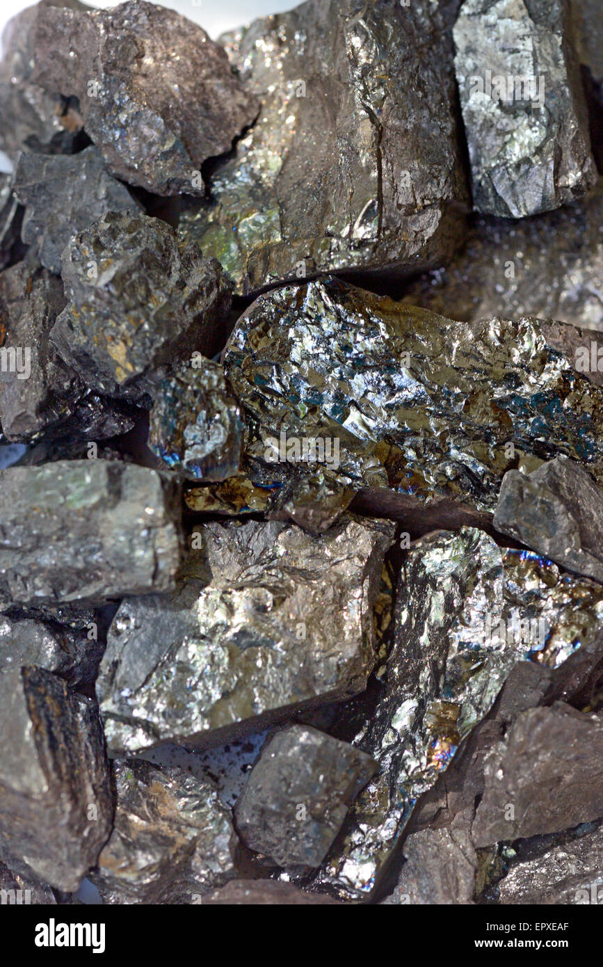 stack of black coal isolated on white background Stock Photo - Alamy