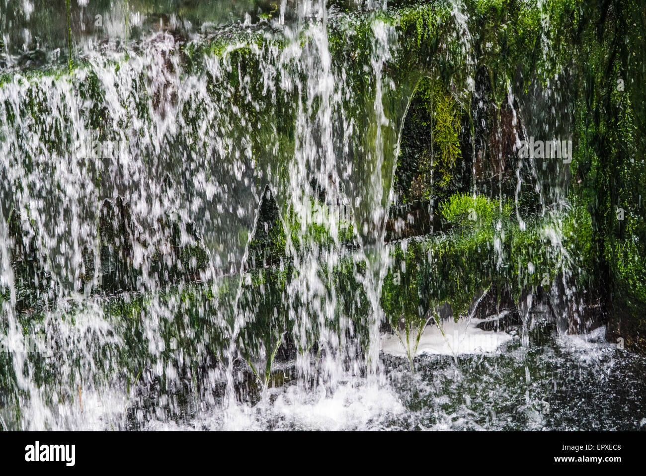 Water cascading from top of lock gates into a canal Stock Photo - Alamy