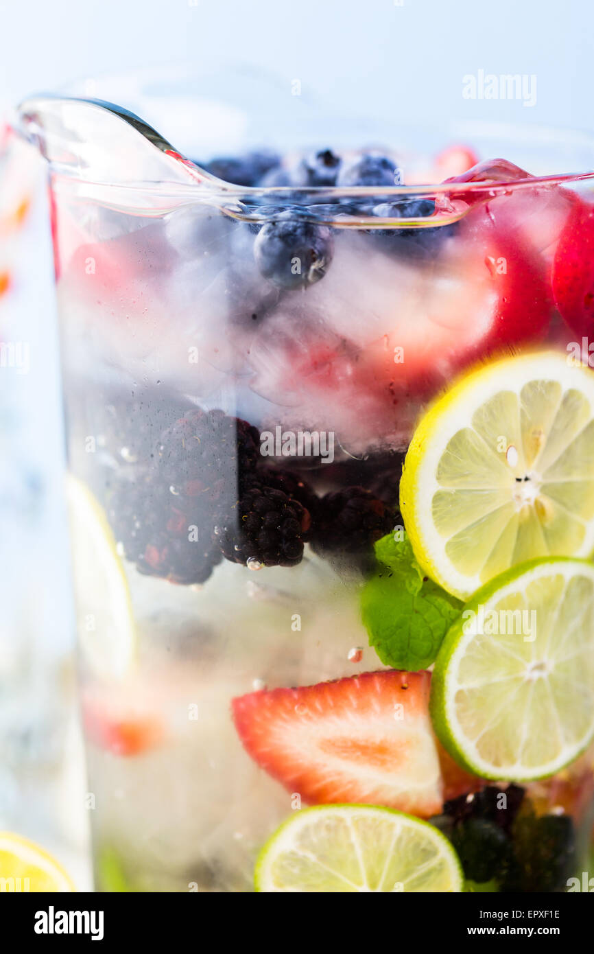 Infused water with fresh organic berries Stock Photo - Alamy