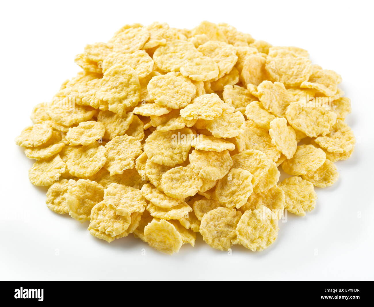 Cornflakes on a white background Stock Photo - Alamy