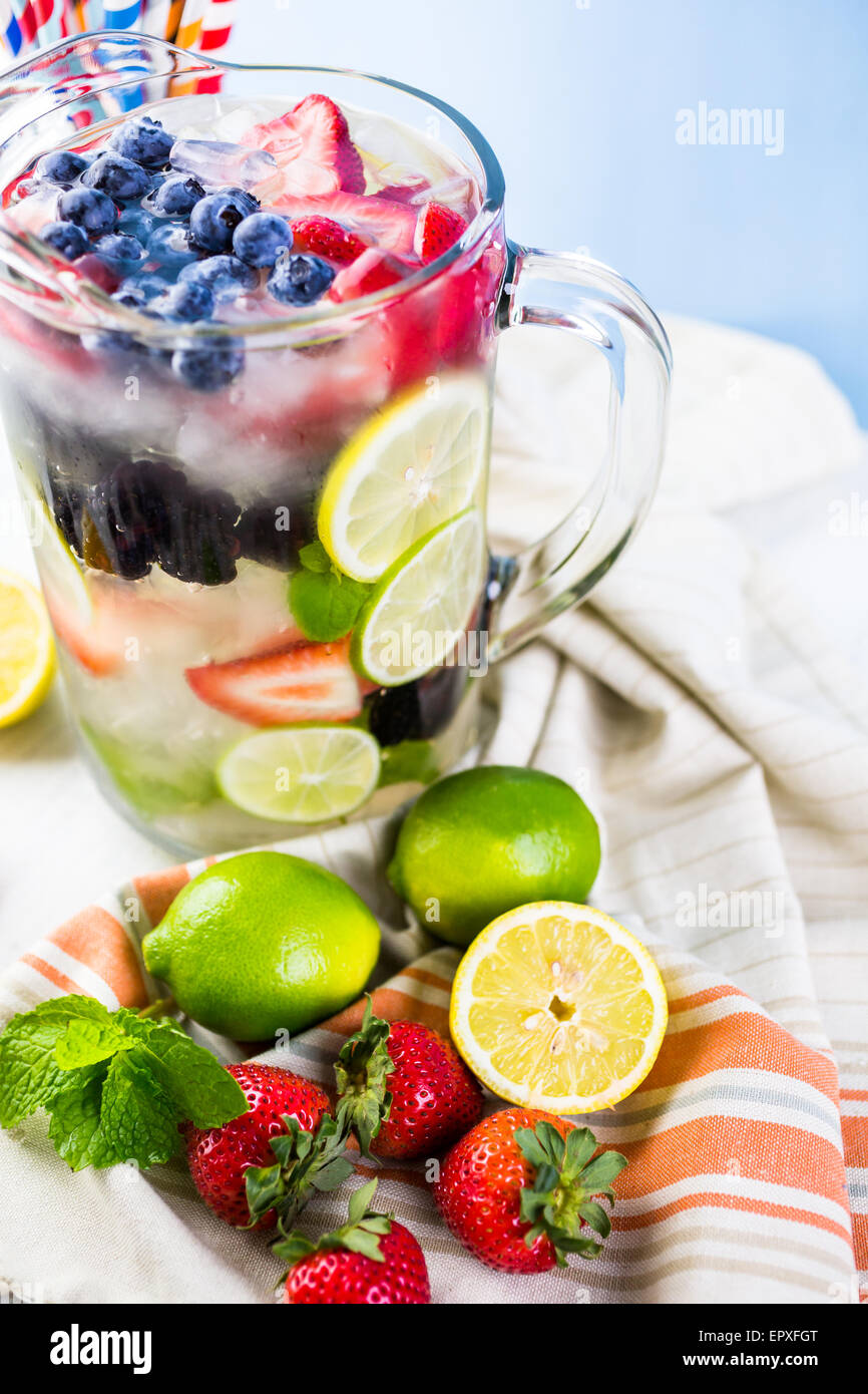 Infused water with fresh organic berries Stock Photo - Alamy
