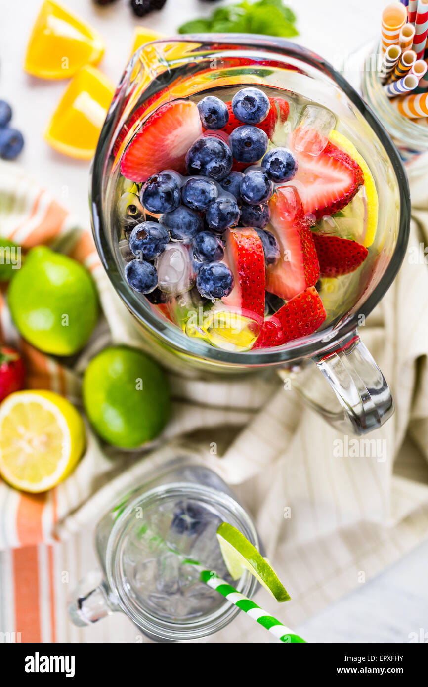 Infused water with fresh organic berries Stock Photo - Alamy