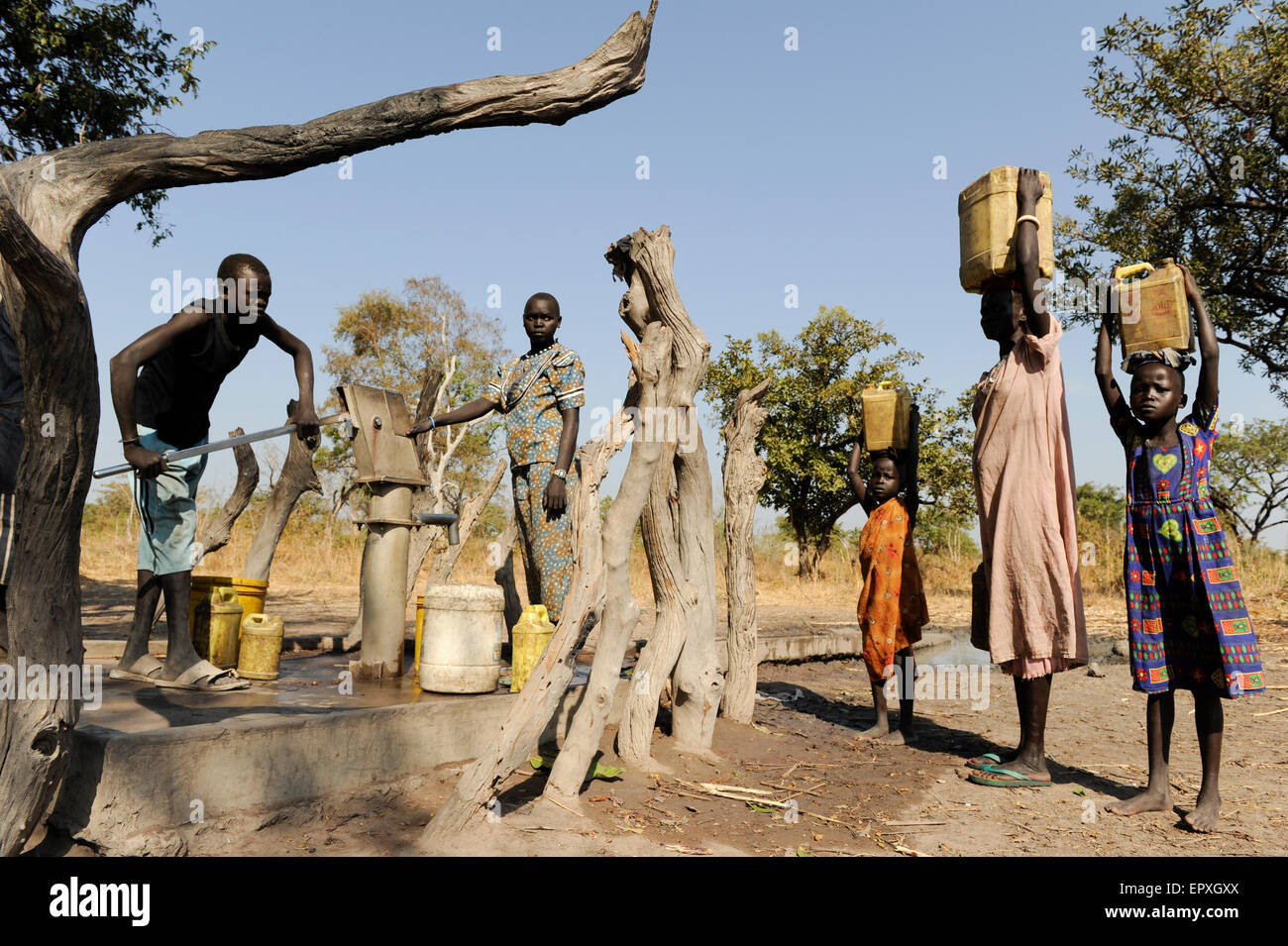 South Sudan Rumbek , Cuibet , Dinka people fetch water from hand pump ...