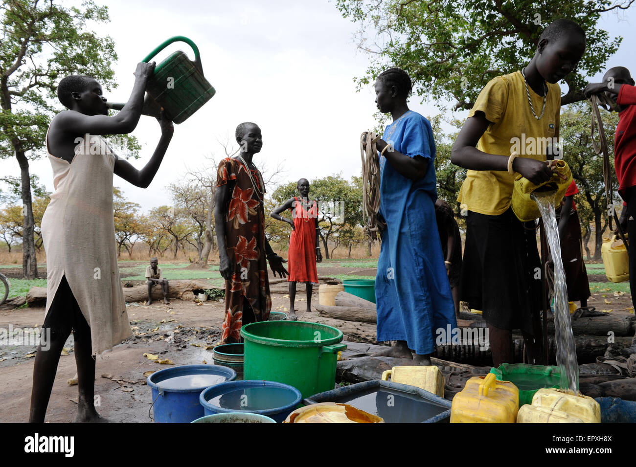 SOUTH-SUDAN Rumbek , village, Colocok, Dinka women fetch water from ...