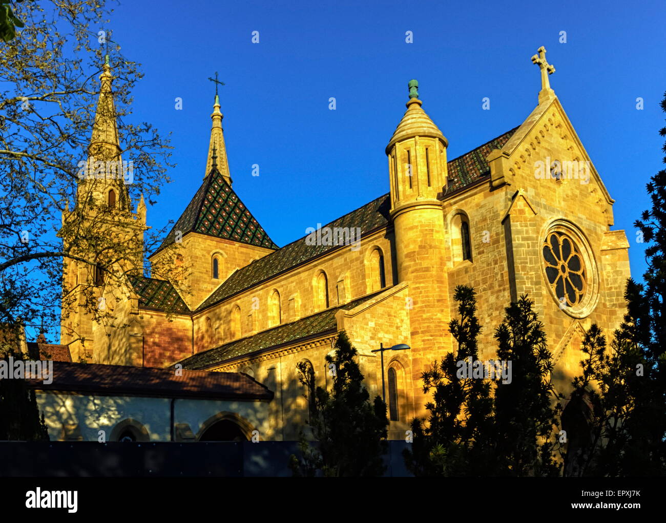 Protestant collegiate Church by sunset, Neuchatel, Switzerland Stock ...