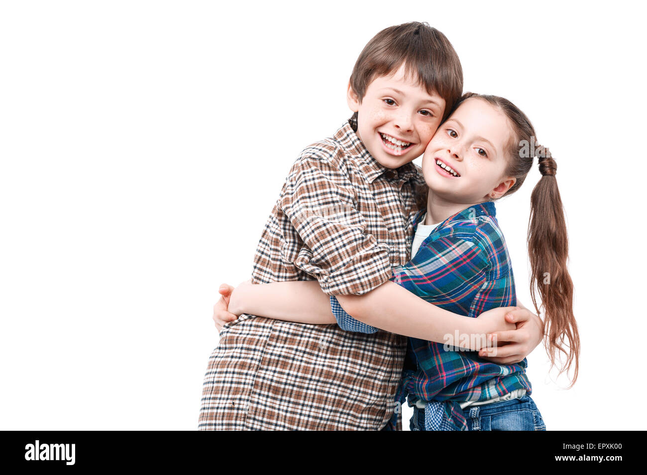Brother and sister embracing Stock Photo - Alamy