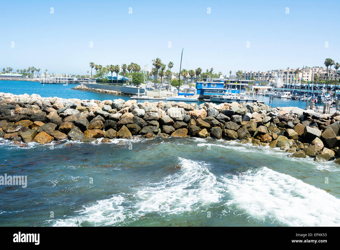 A view of King Harbor breakwater during a bright, sunny day reveals the ...