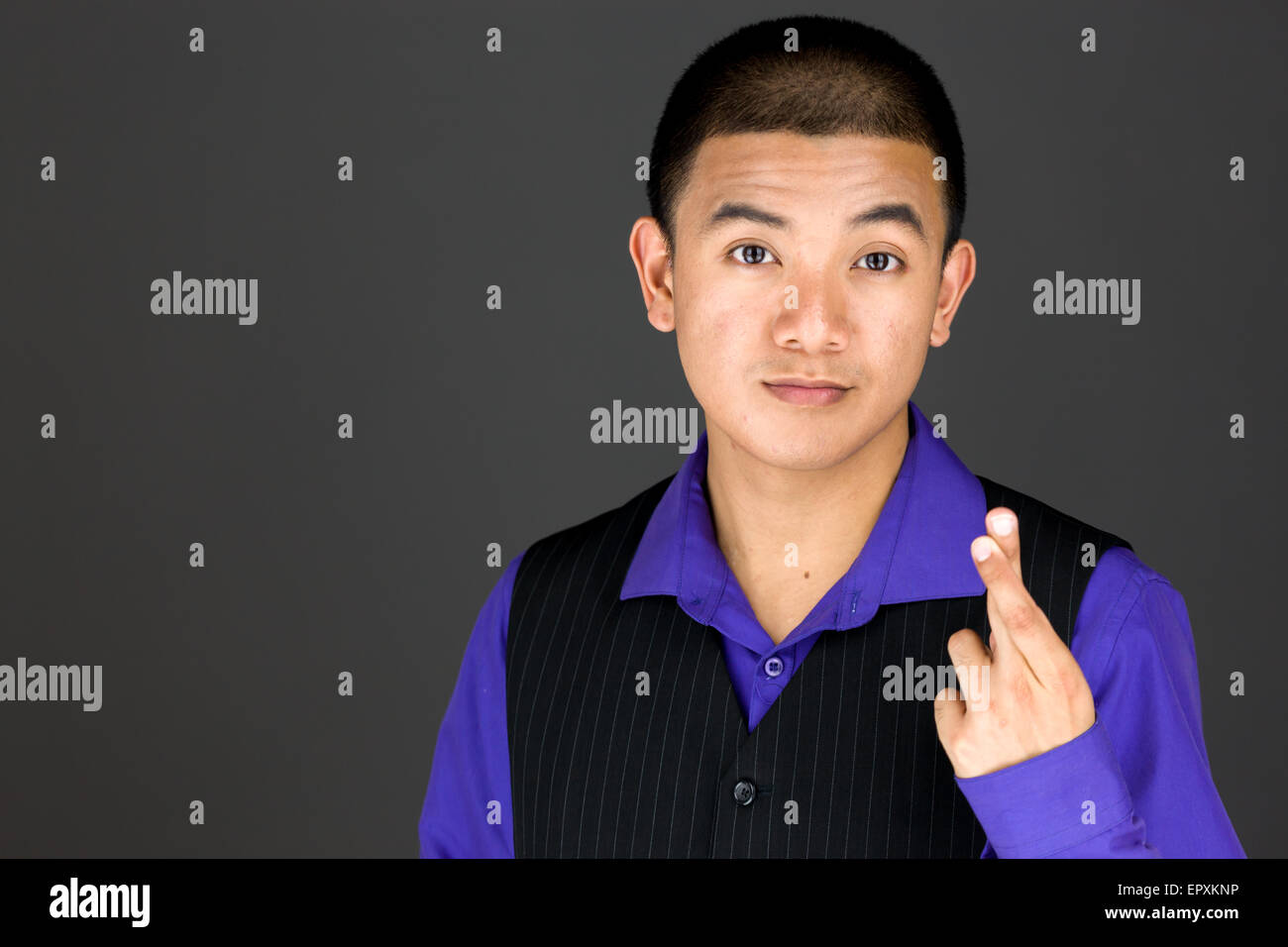 Model in studio isolated on plain grey background Stock Photo - Alamy