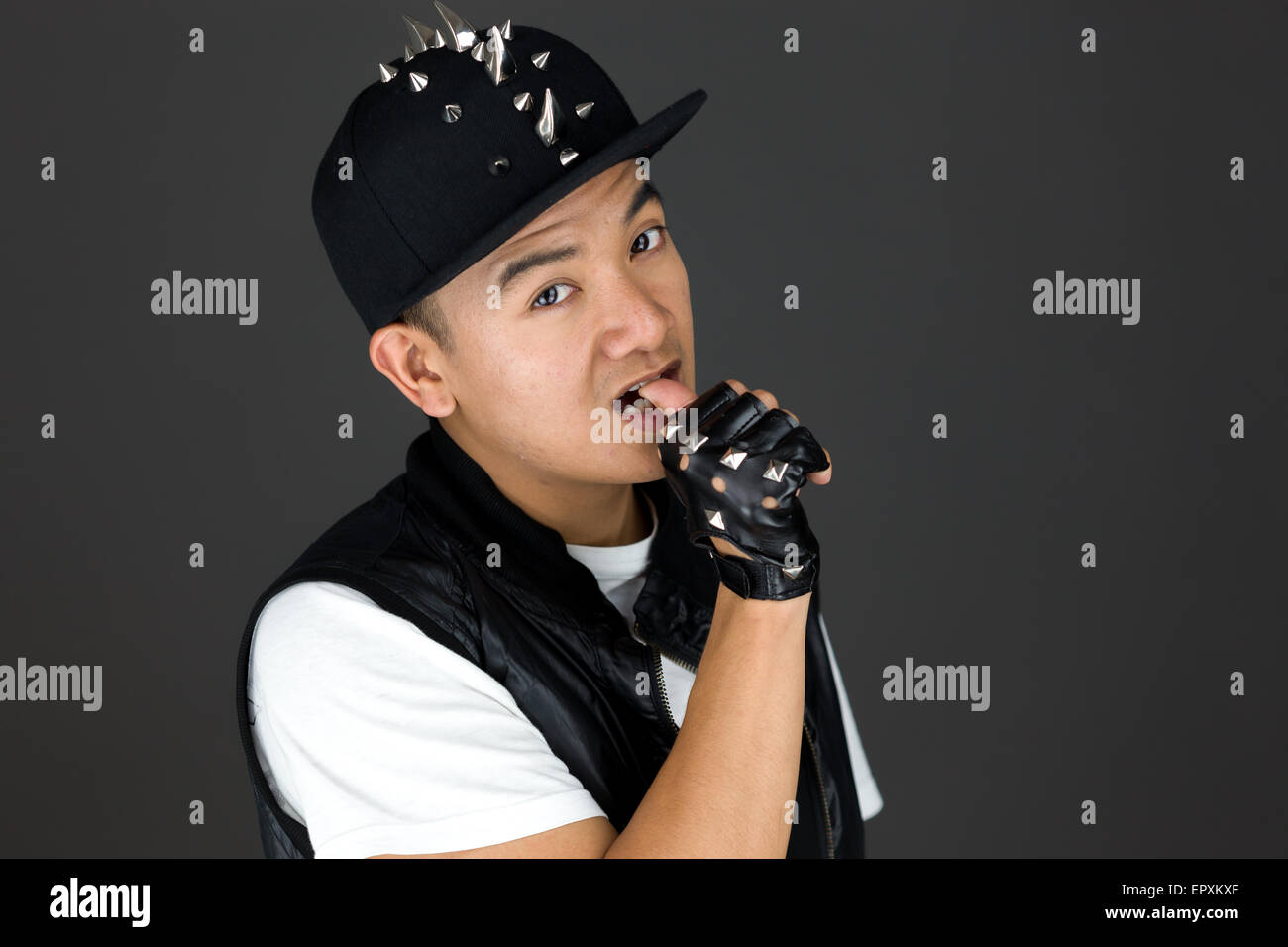 Model in studio isolated on plain grey background Stock Photo - Alamy