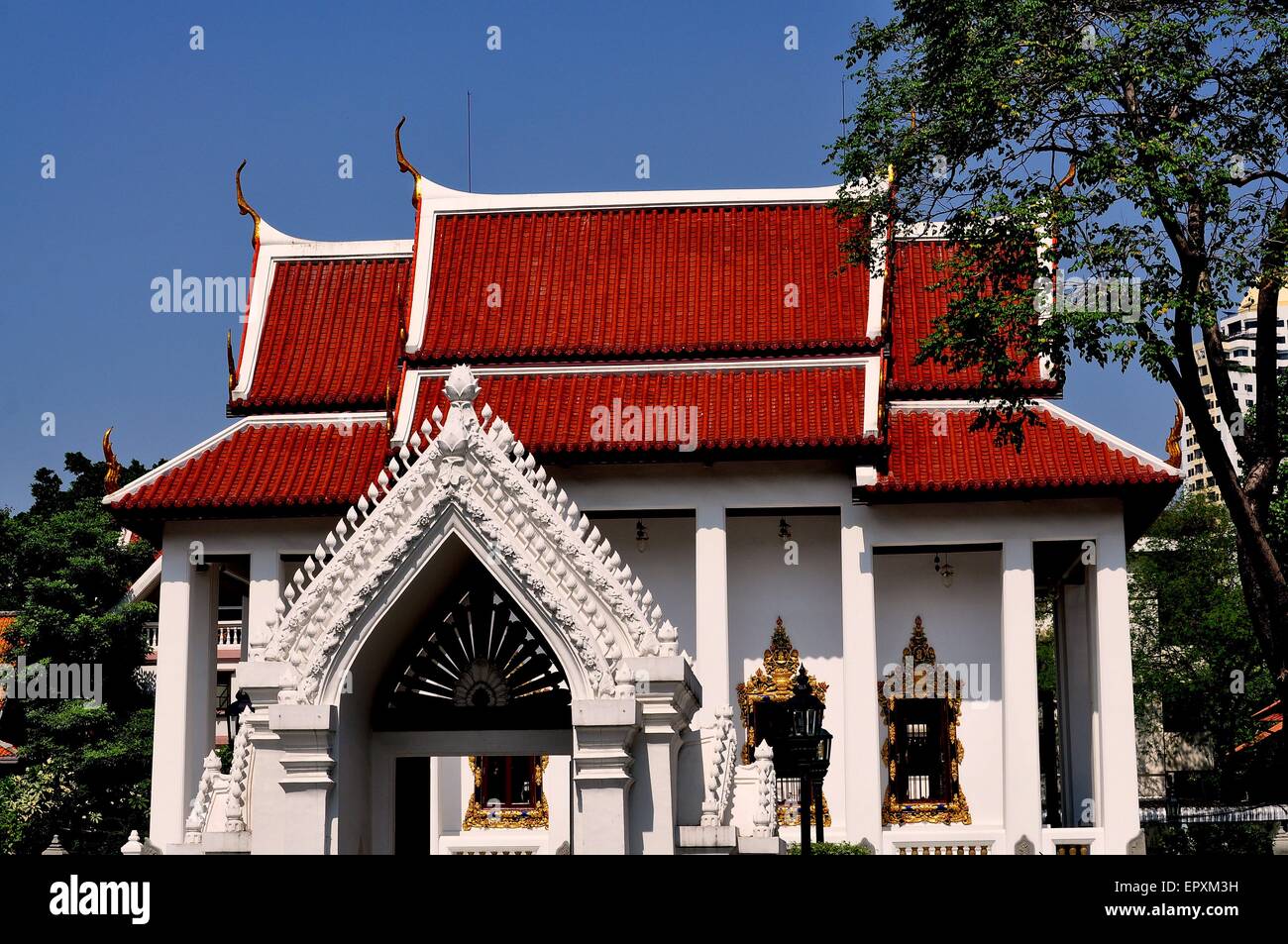 Bangkok, Thailand: Ornate entrance gate and Ubosot sanctuary hall with ...