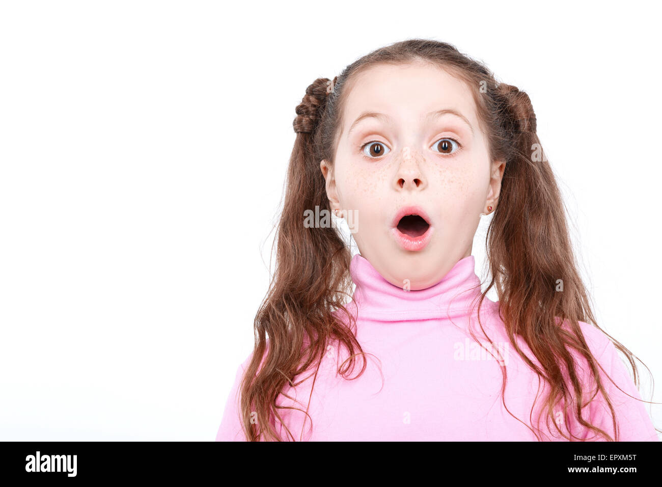Portrait of a small emotional girl Stock Photo - Alamy