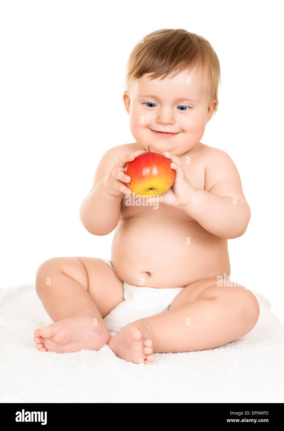 baby with apple on white Stock Photo - Alamy