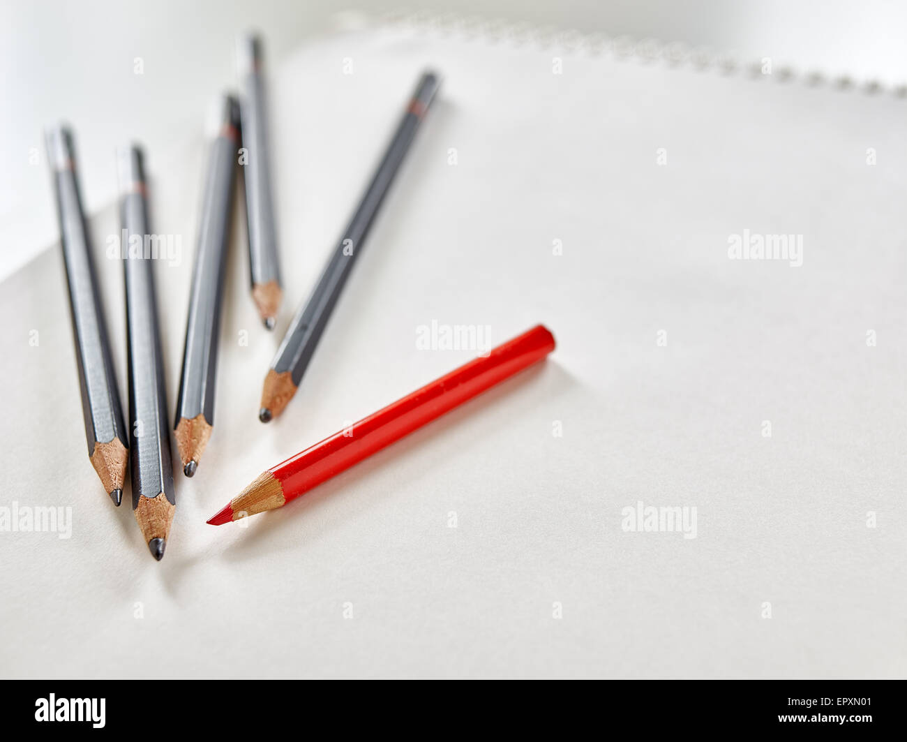 Pencils, one different inside the group Stock Photo - Alamy