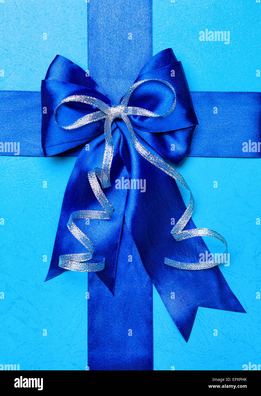 blue bow made from silk on cyan background Stock Photo - Alamy
