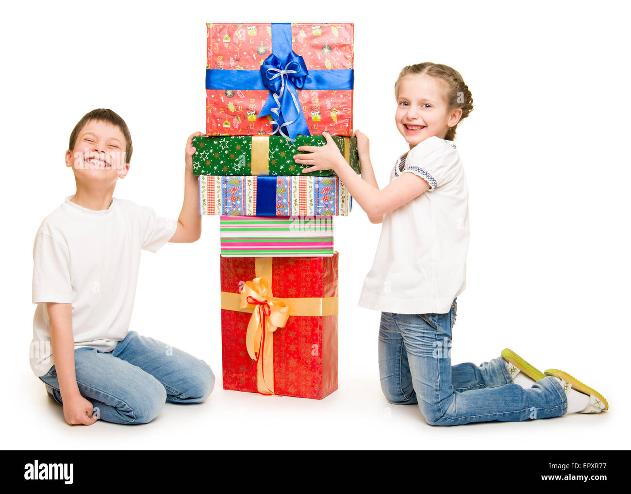 two child with gift boxes on white Stock Photo - Alamy