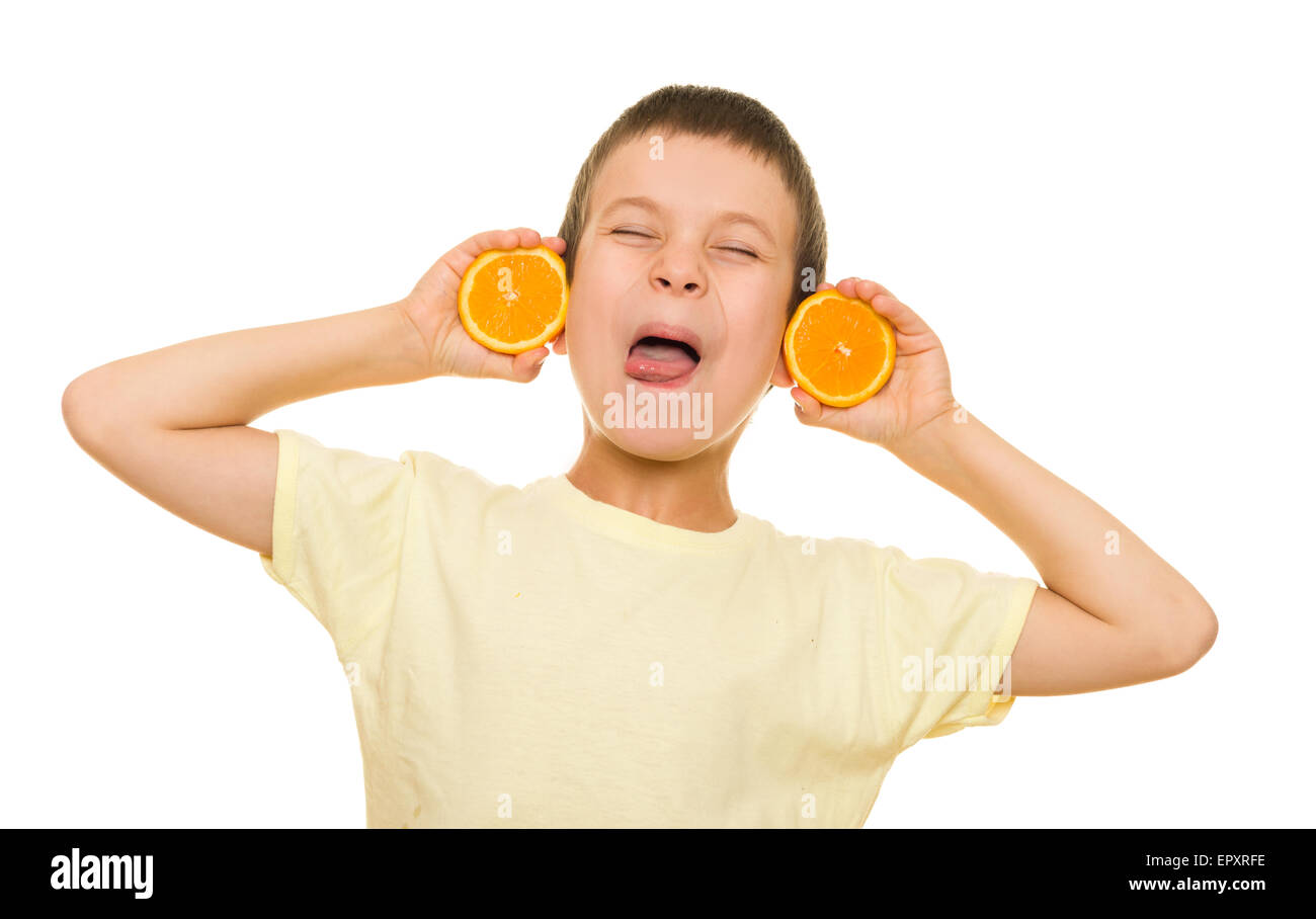 boy with sliced oranges having fun Stock Photo - Alamy