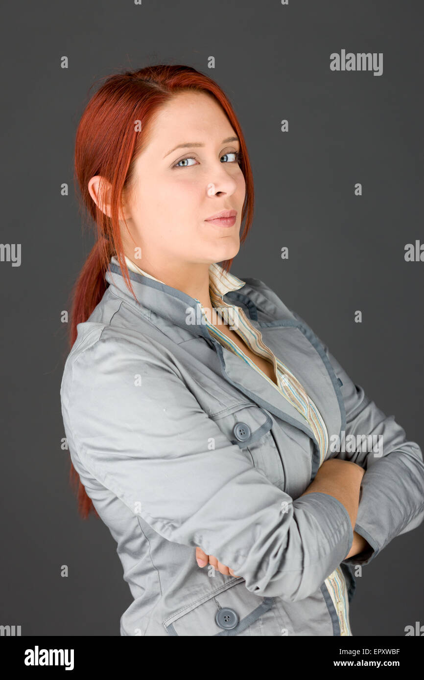 Model in studio isolated on plain grey background Stock Photo - Alamy