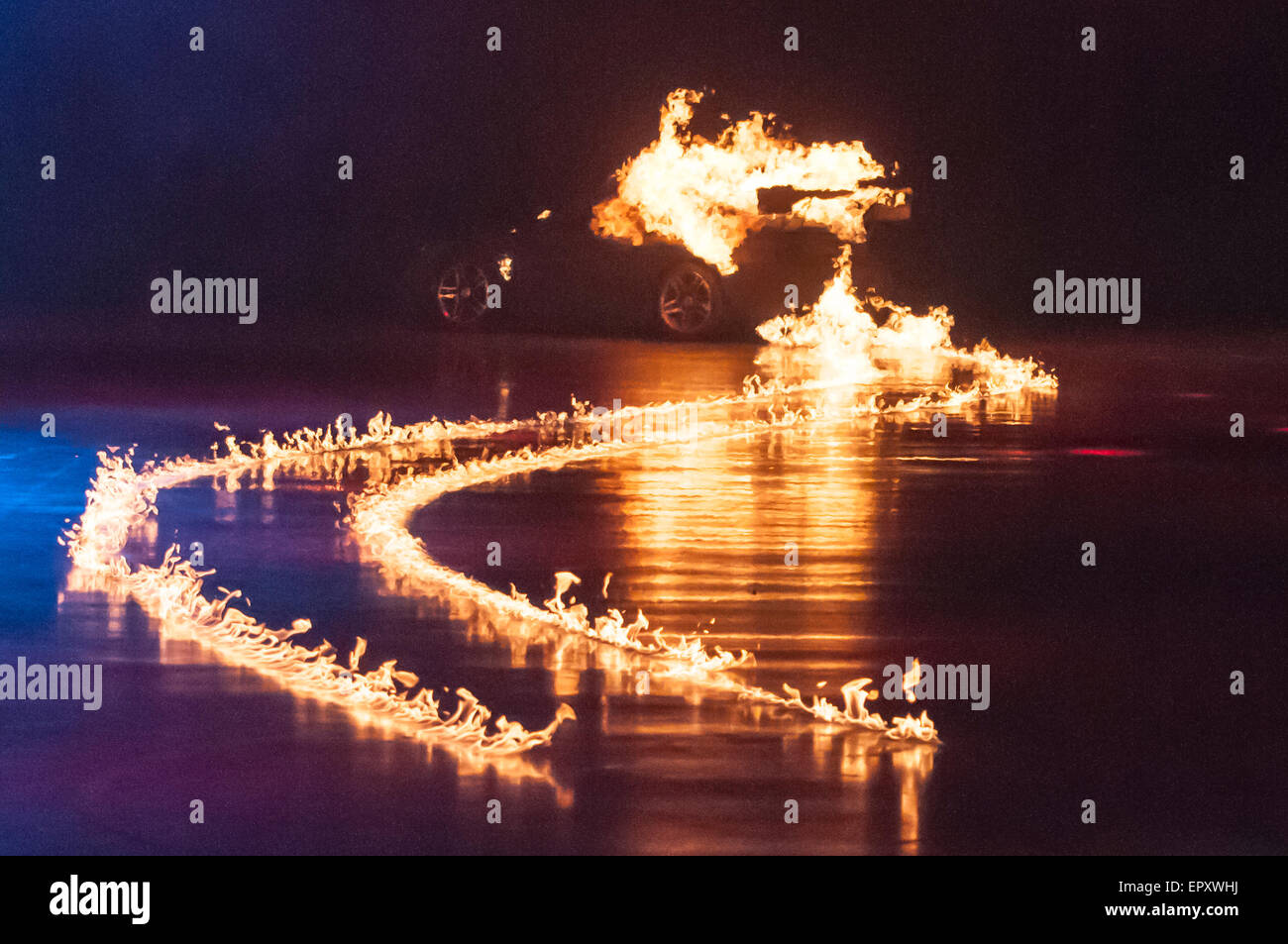 Belfast, Northern Ireland. 22 May 2015 - A Porsche 911 leaves flaming ...