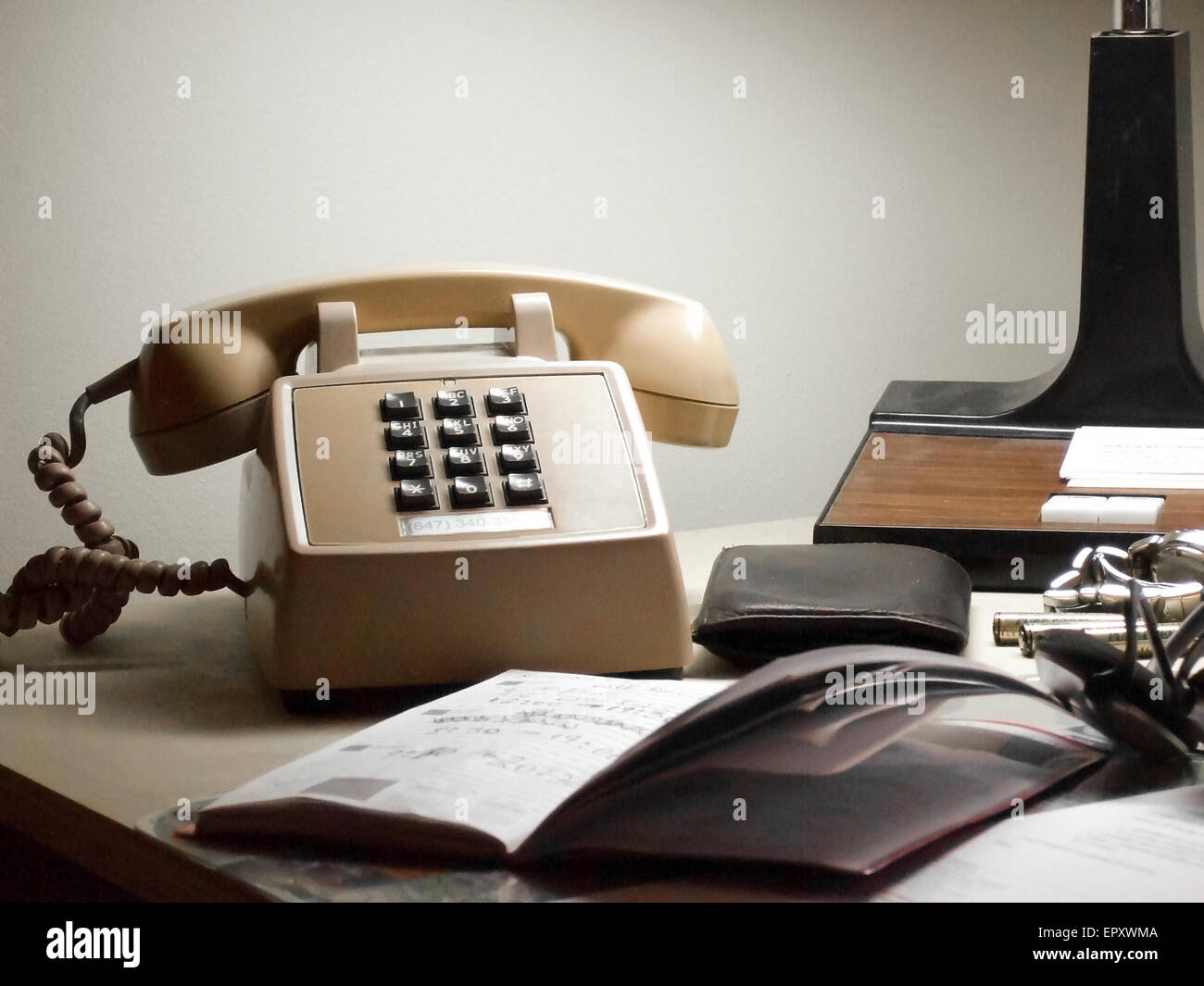 Close-up of a landline phone on a table Stock Photo - Alamy