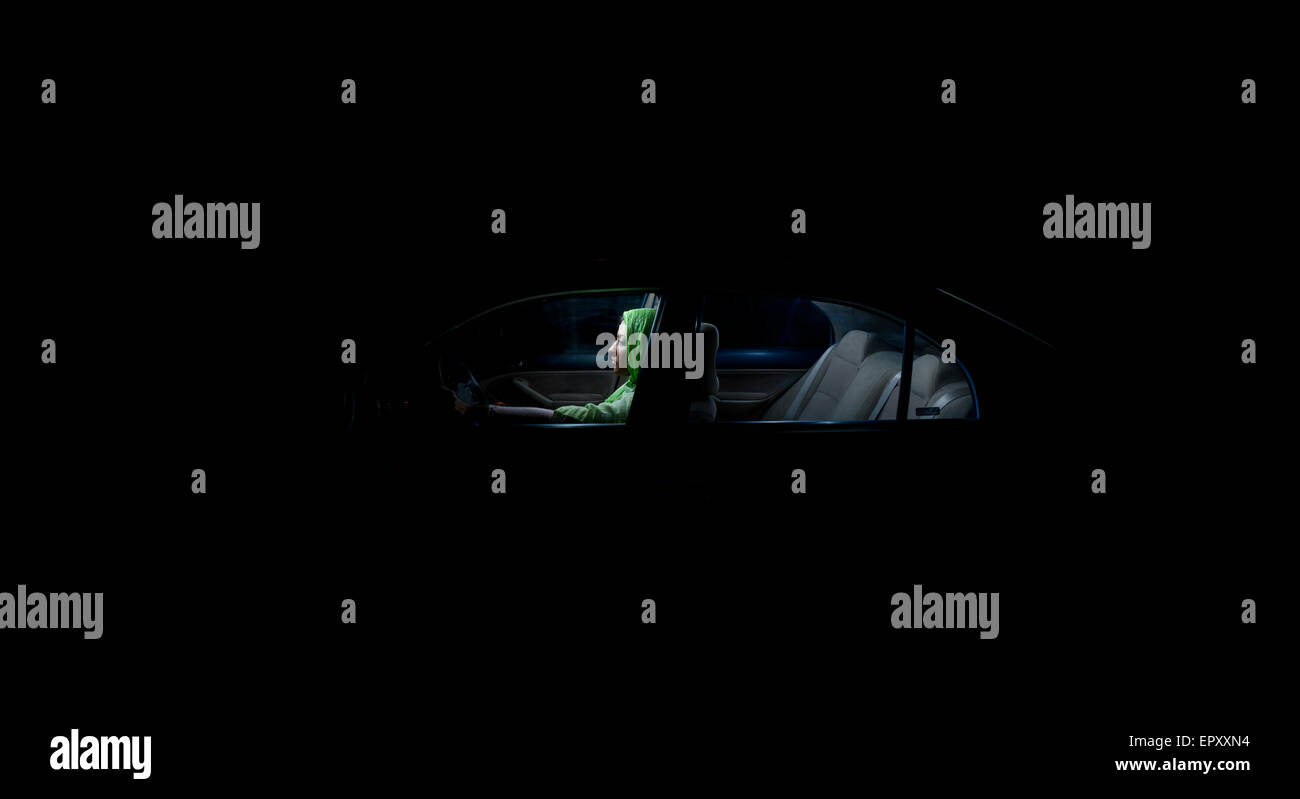 LOS ANGELES, CA – MAY 18: Moslem woman driving automobile on the ...