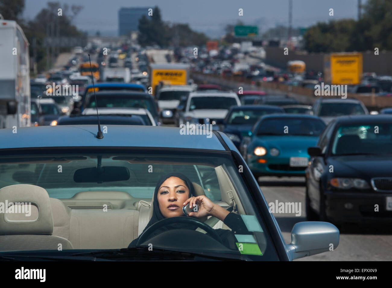 LOS ANGELES, CA – MAY 18: Moslem woman driving automobile on the ...